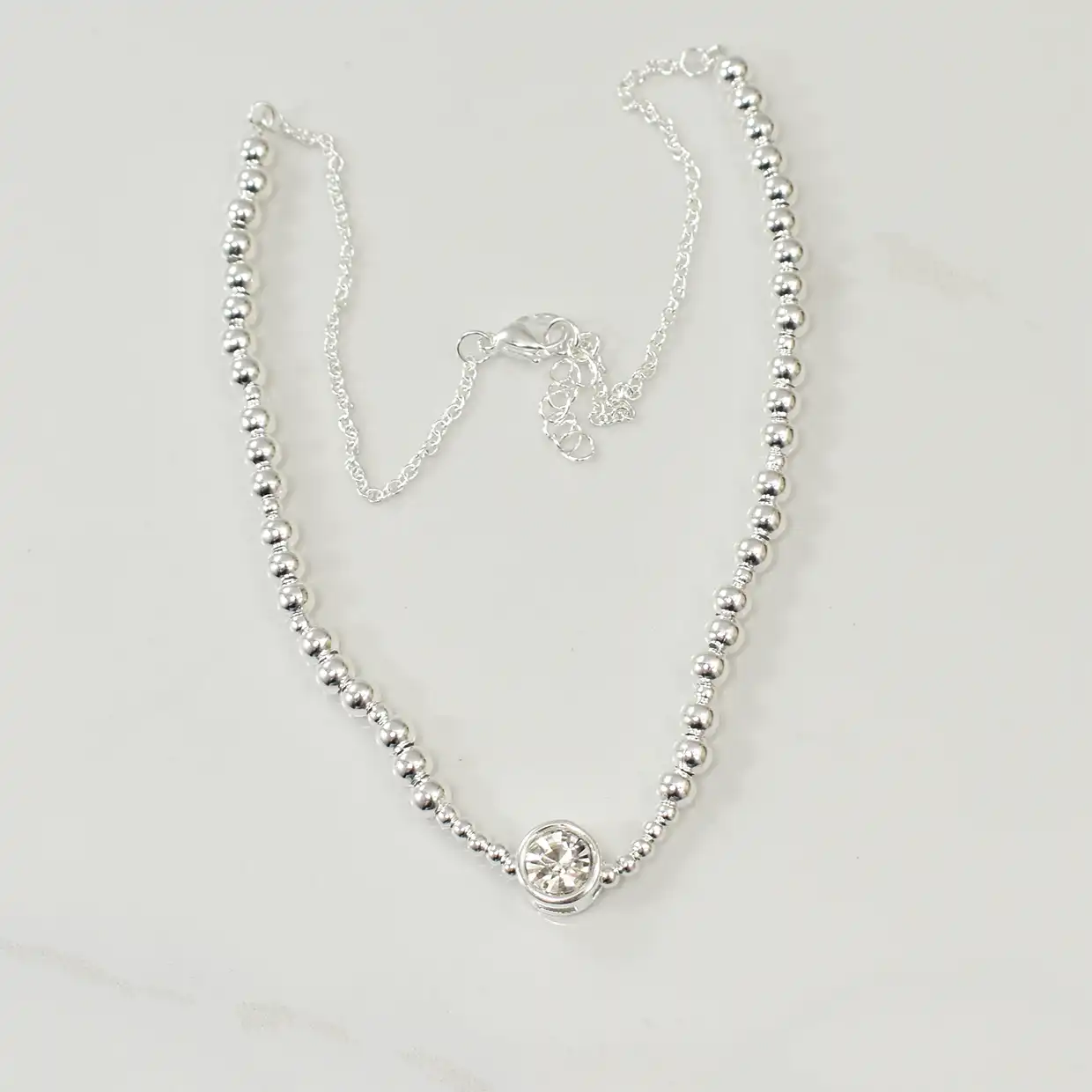 CADENA CON DIJE SUSANITO Y BOLITAS - Maba Joyas